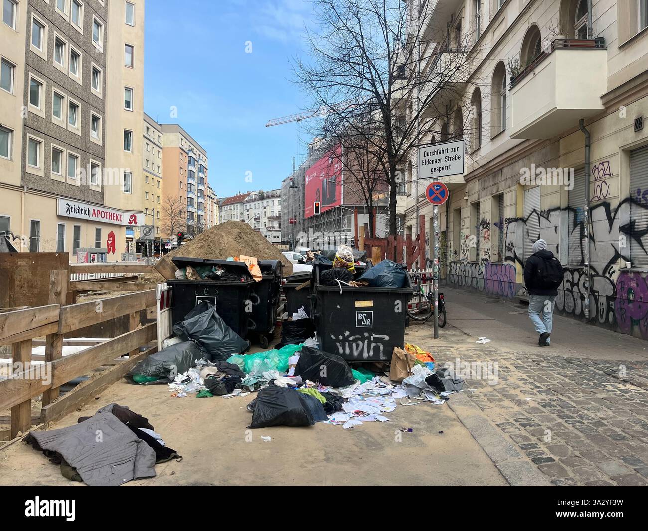 Berlin, Germany. 14th Mar, 2025. Garbage cans are overflowing in Berlin ...