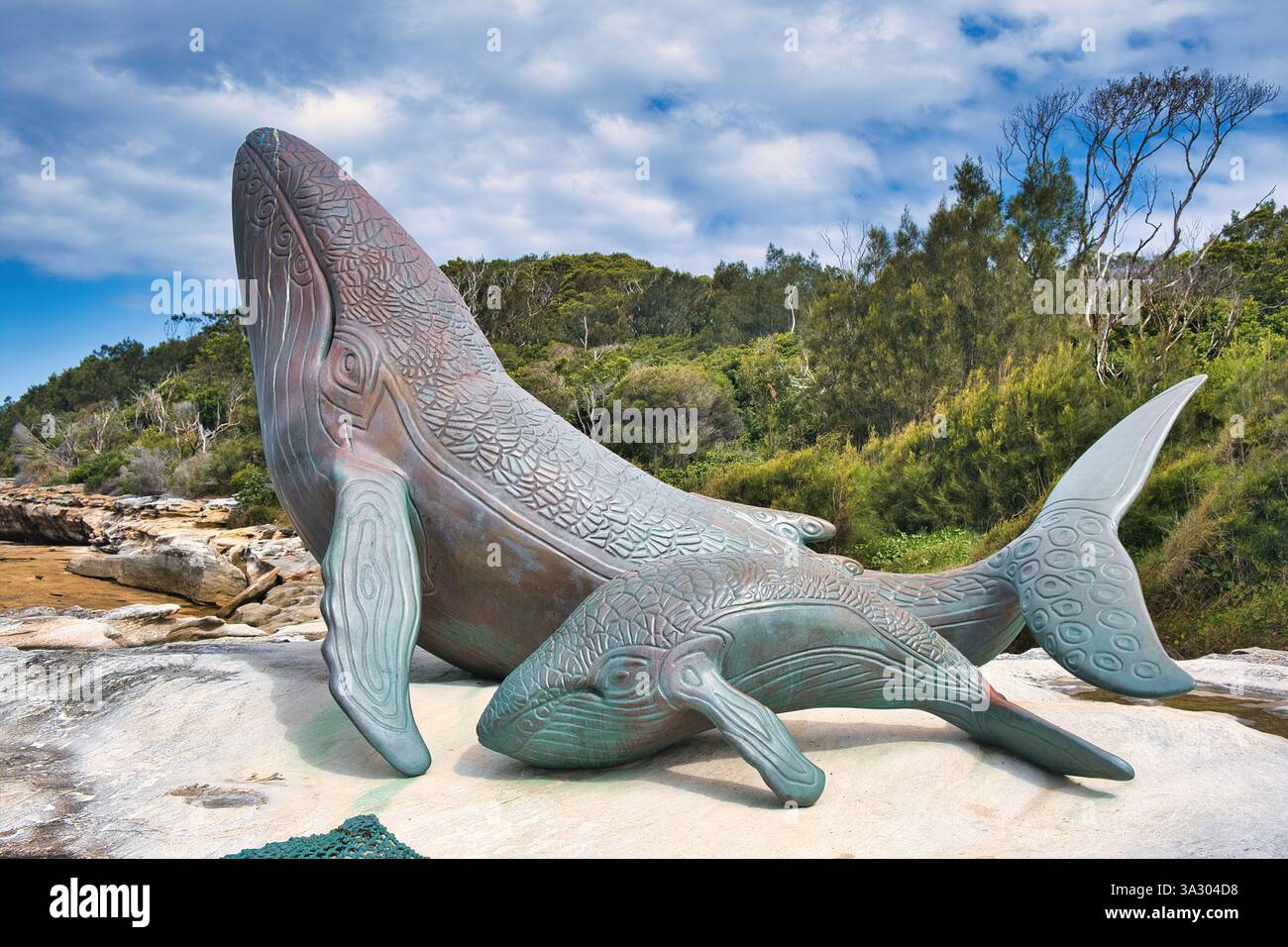 Bronze sculpture of a whale with a calf in Kamay Botany Bay National ...
