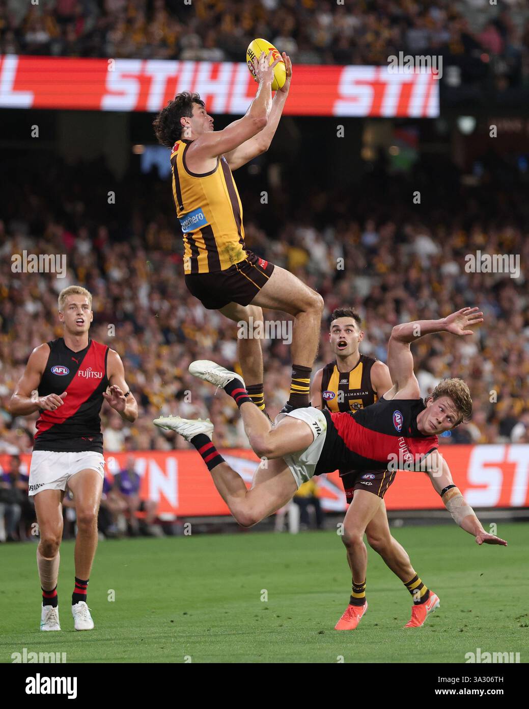Melbourne, Australia. 14th Mar, 2025. Tom Barrass of the Hawks takes a ...