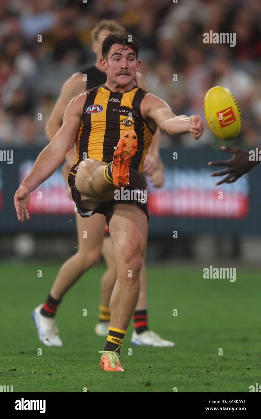 Melbourne, Australia. 14th Mar, 2025. Jai Newcombe of the Hawks kicks ...