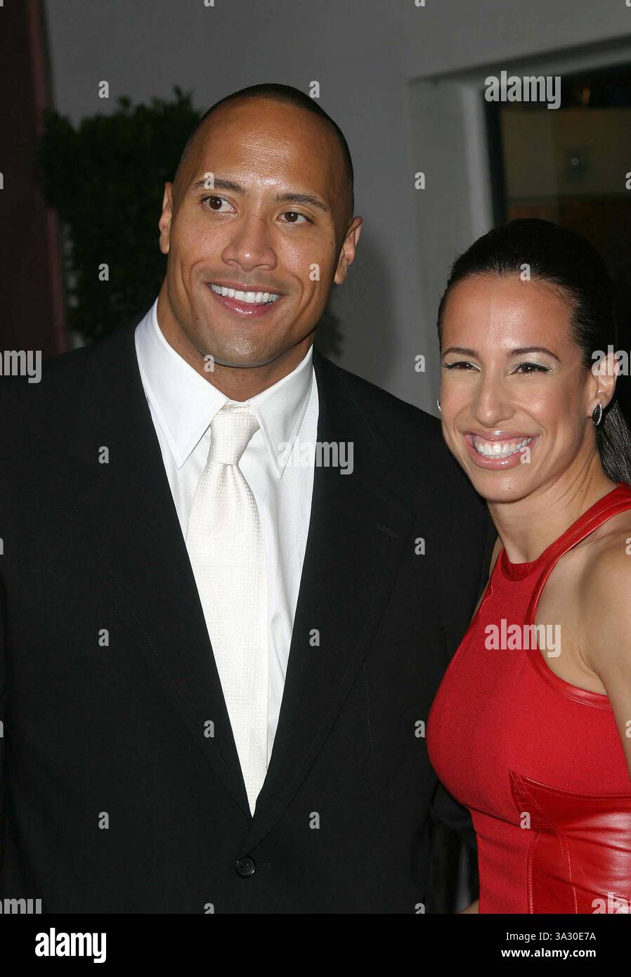 Sept. 22, 2003 - Hollywood, CA, USA - THE ROCK AND WIFE -..THE RUNDOWN ...