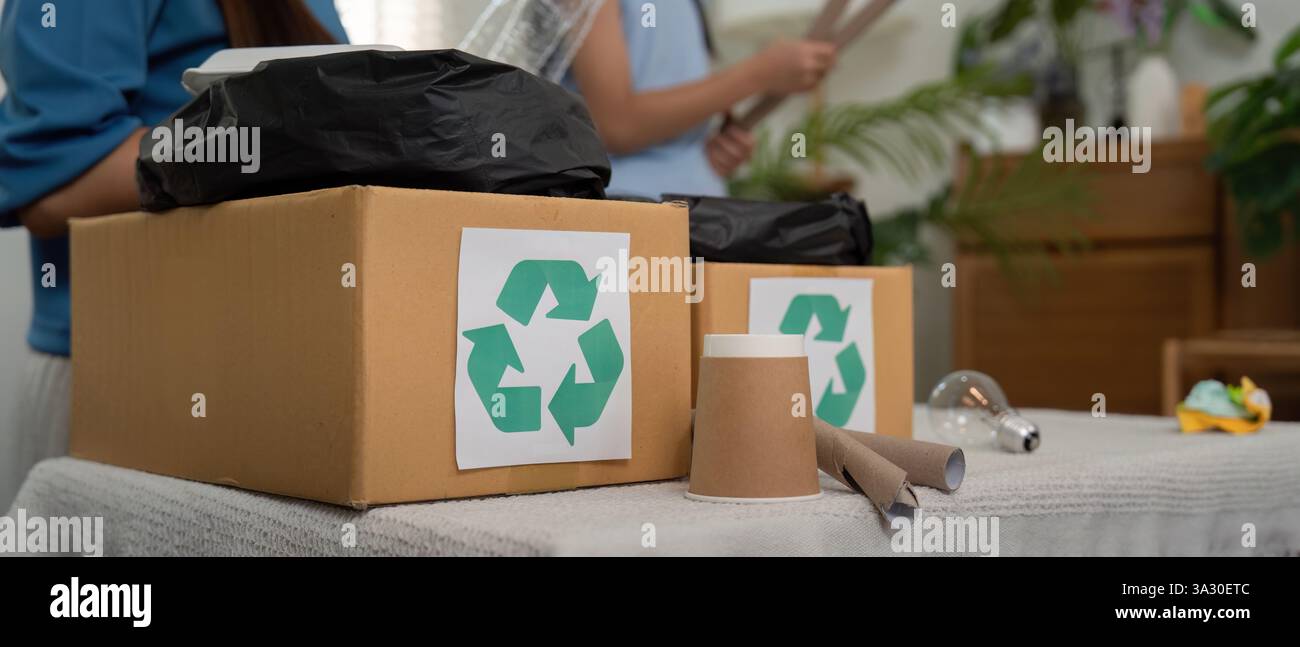 Recycling and Eco-Friendly Practices. A family engaging in sustainable ...