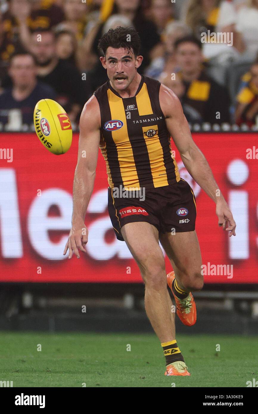 Jai Newcombe of the Hawks passes the ball during the AFL Round 1 match ...