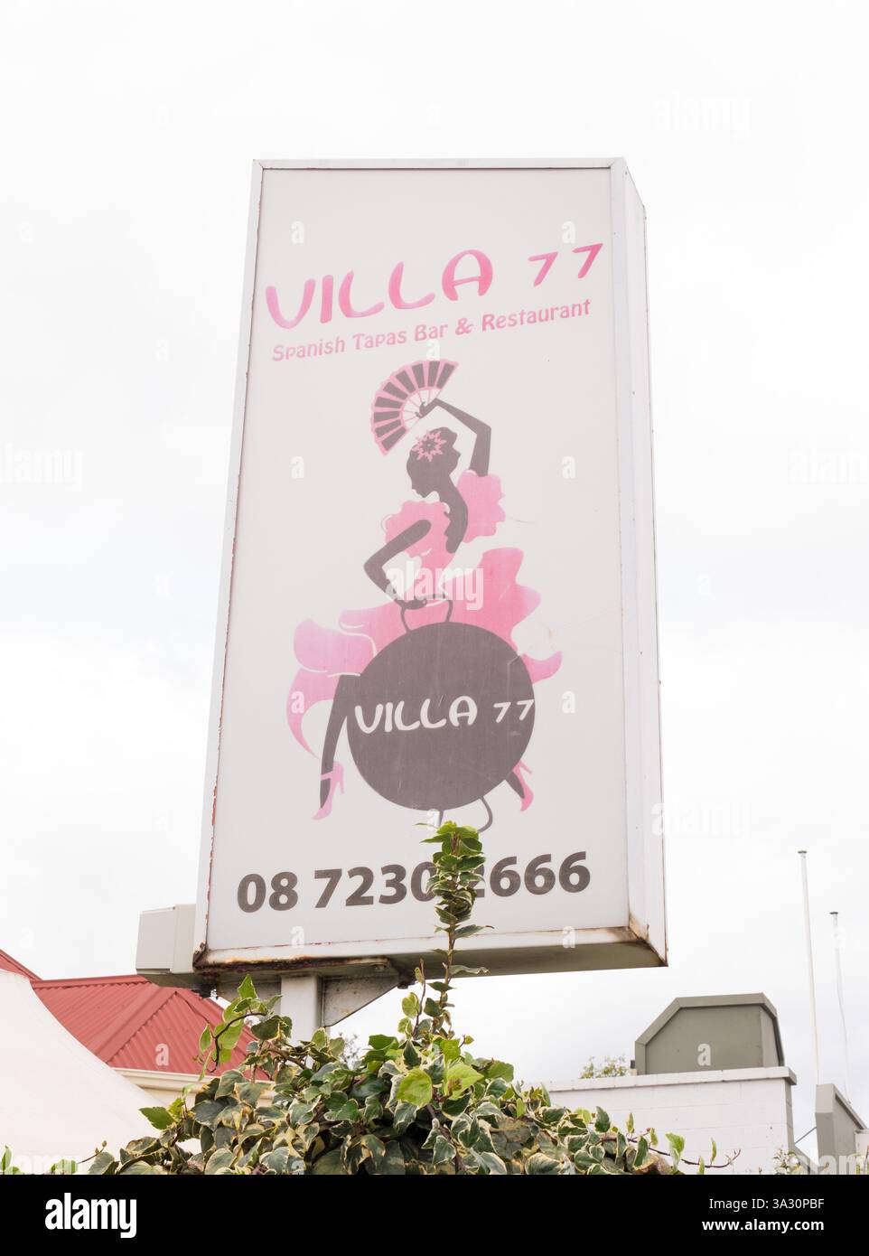 Rectangular sign with advertising for Villa 77 Spanish bar and ...