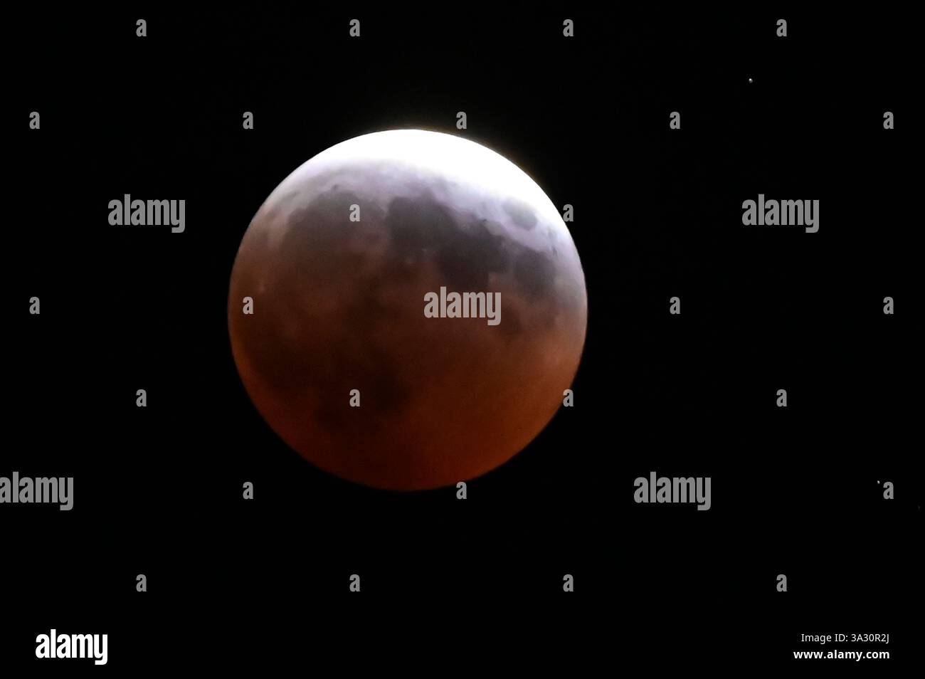 General view of the total lunar eclipse where the moon will be tinged ...