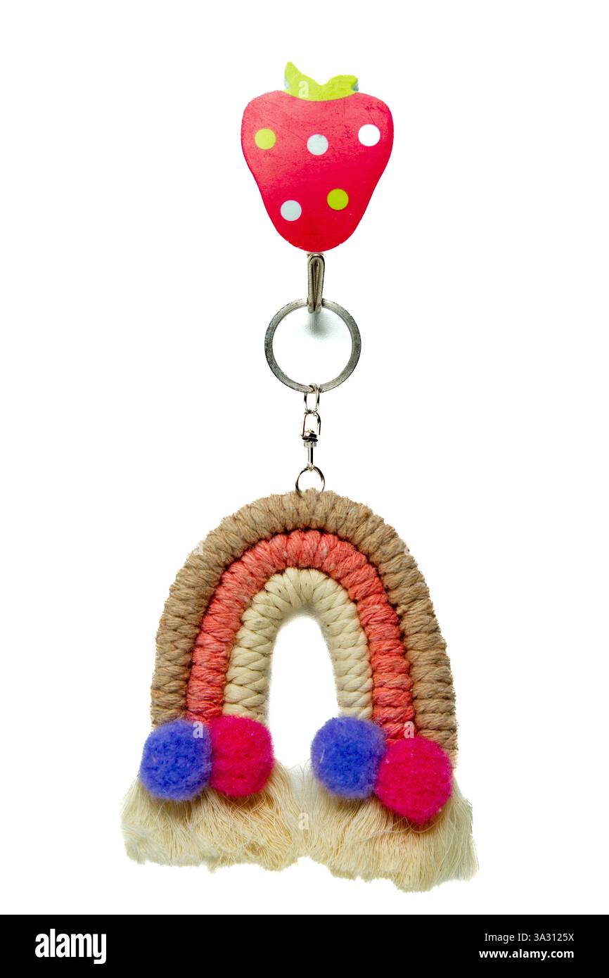 Macrame keychain on a white background. This is a handmade key chain ...