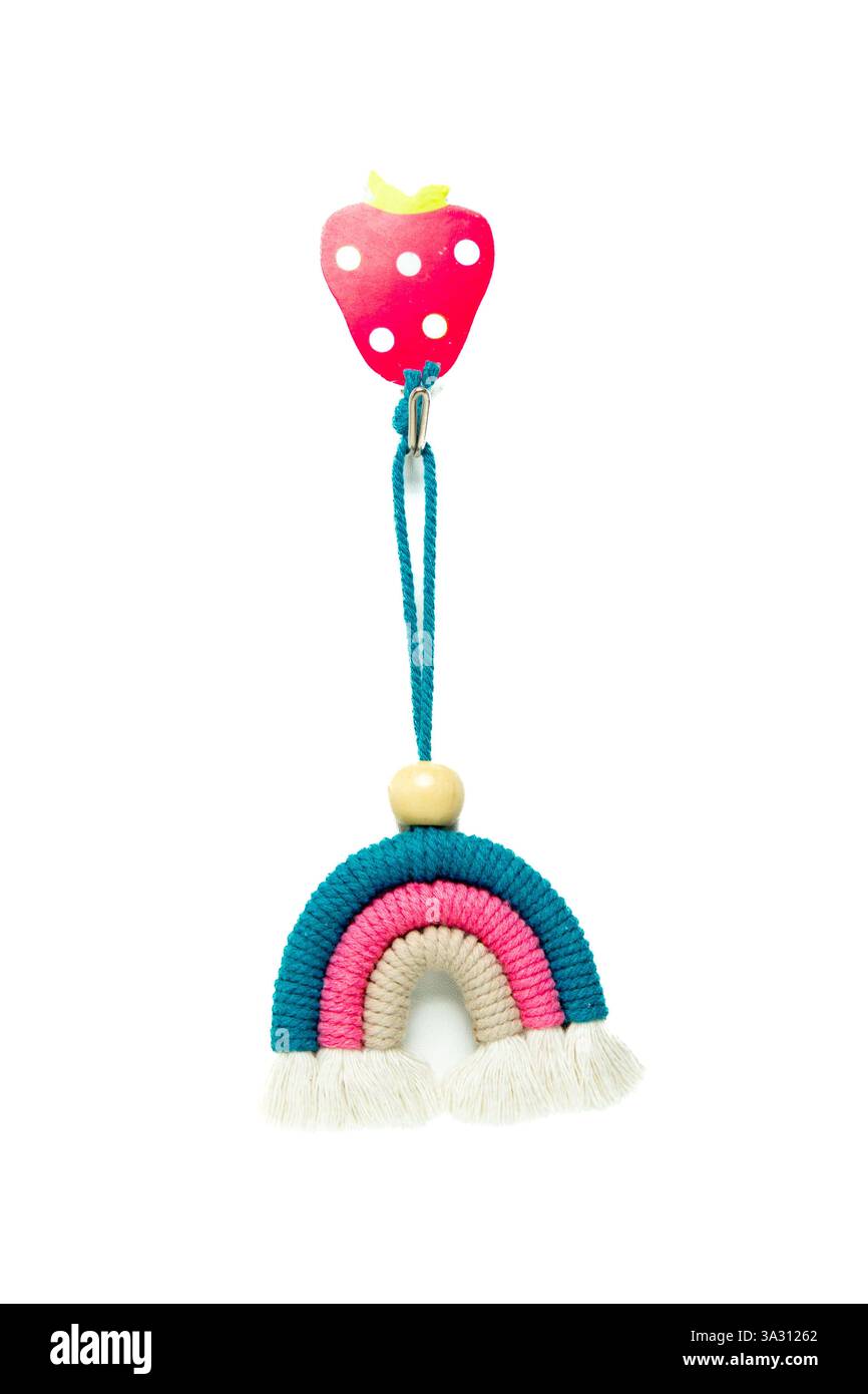 Macrame keychain on a white background. This is a handmade key chain ...