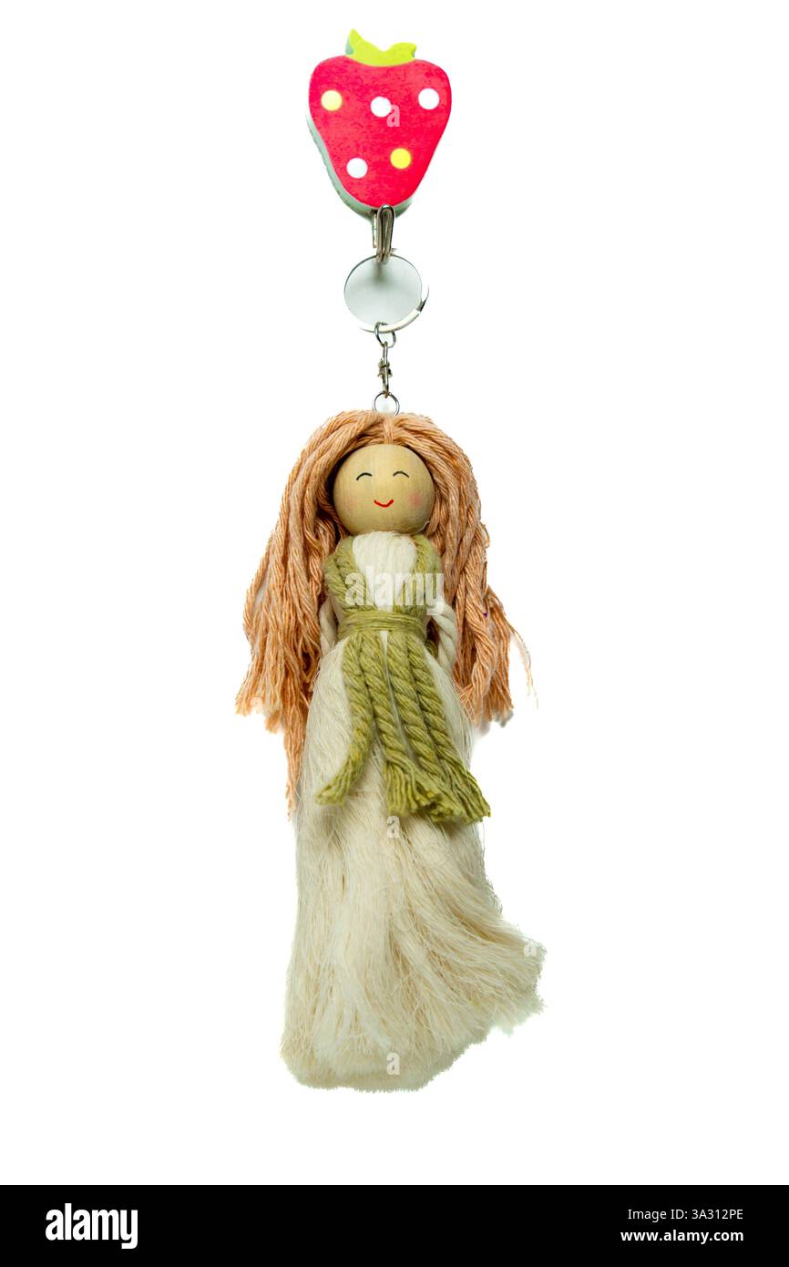 Macrame keychain on a white background. This is a handmade key chain ...