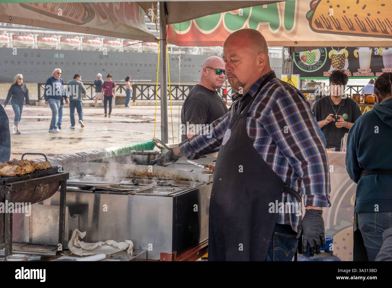 Mexican Man Making And Selling Chicken Tacos In Ensenada Mexico, In The ...