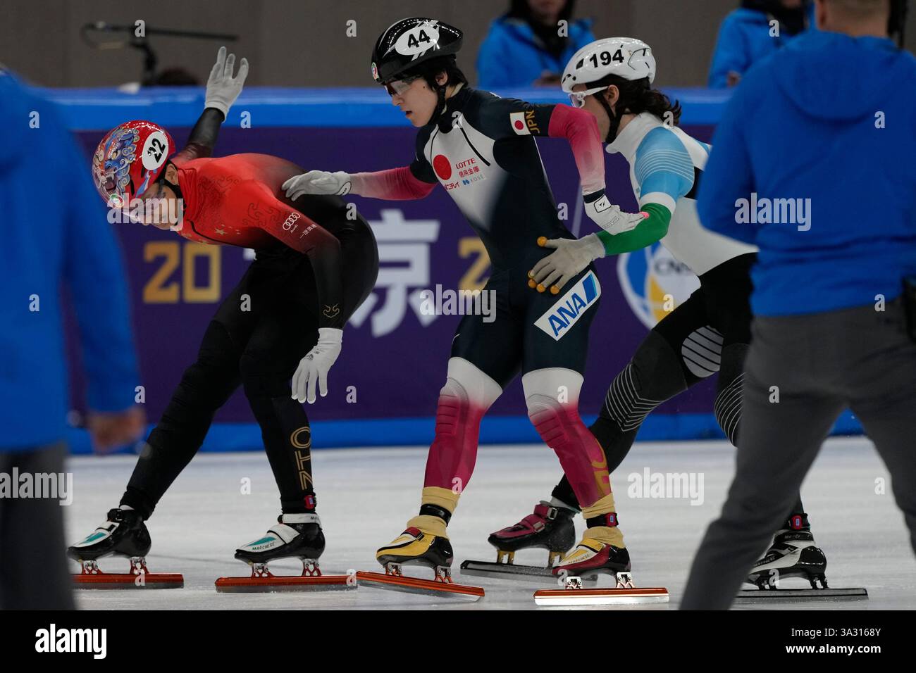 From left, China's Sun Long, Japan's Kosei Hayashi and Uzbekistan's ...
