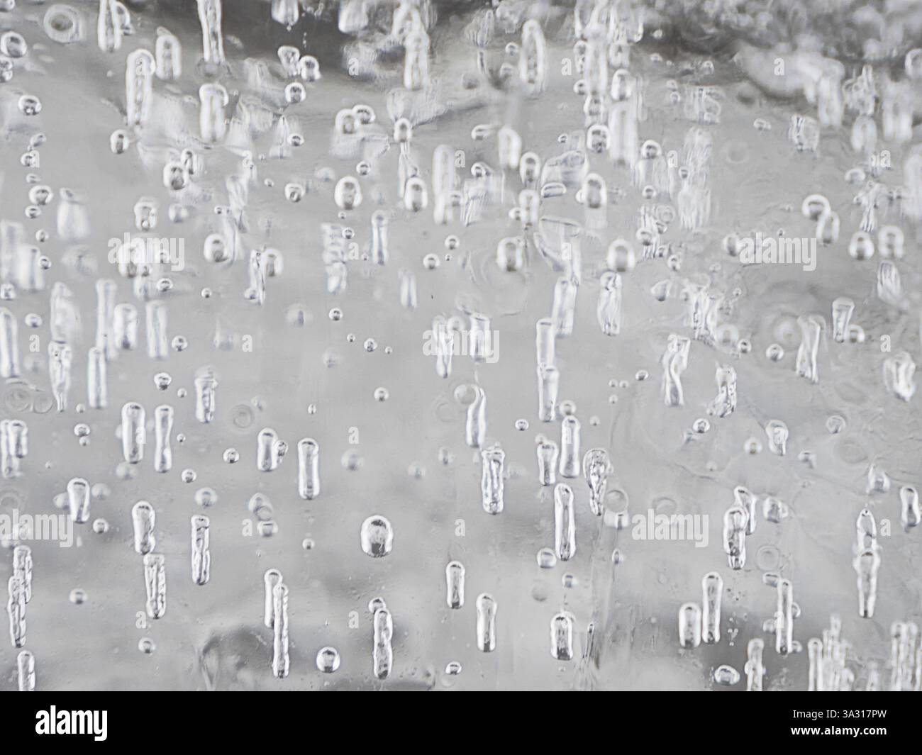 Ice texture of frozen air bubbles floating up, close up Stock Photo - Alamy