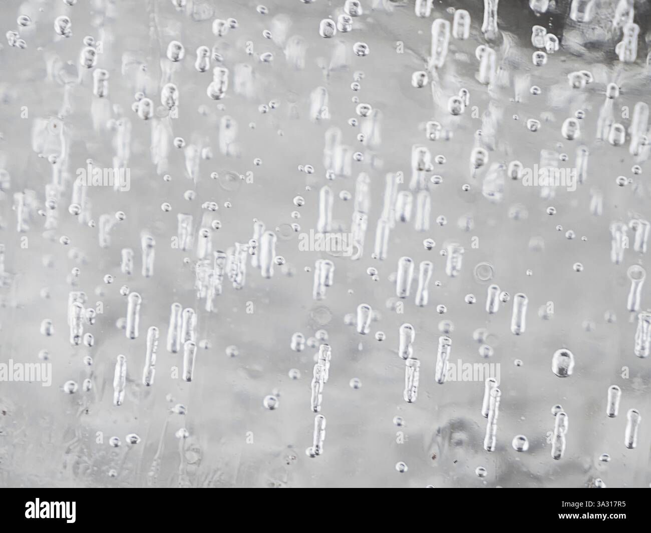 Ice texture of frozen air bubbles floating up, close up Stock Photo - Alamy