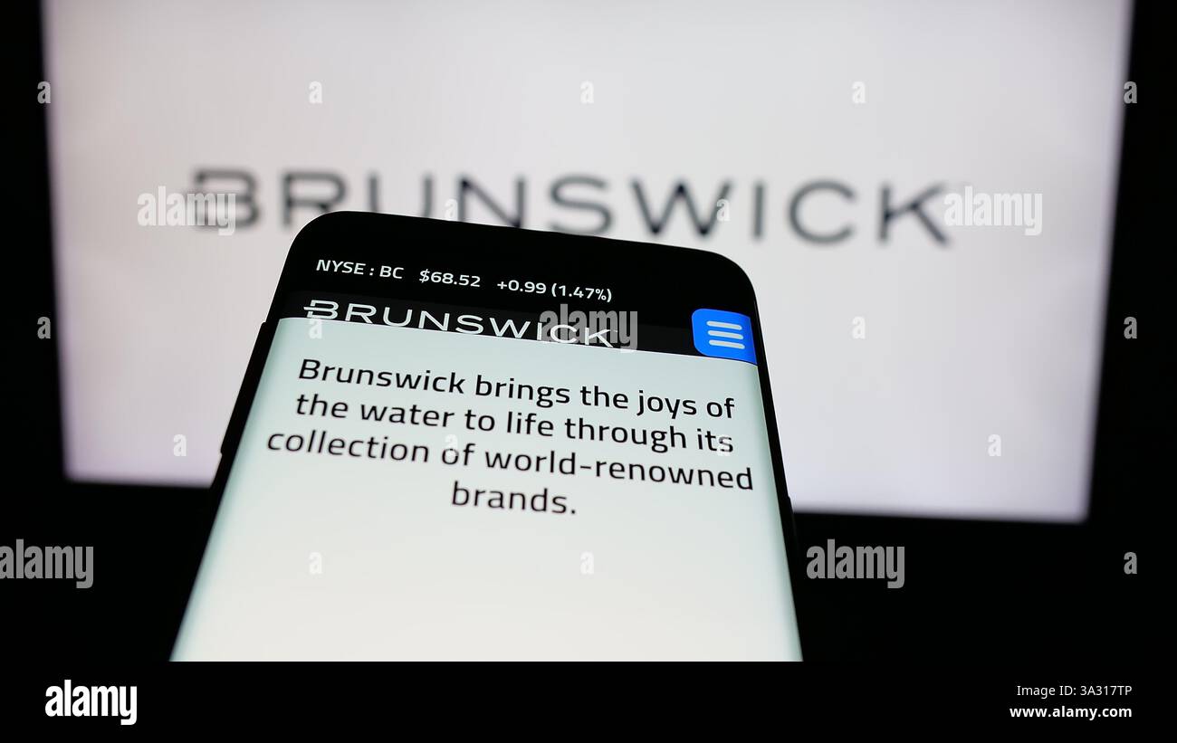 In this photo illustration, a mobile phone with the website of US ...