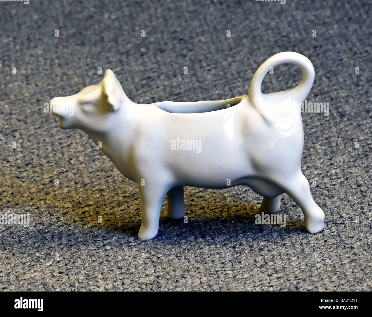 White ceramic cow creamer milk jug Stock Photo - Alamy