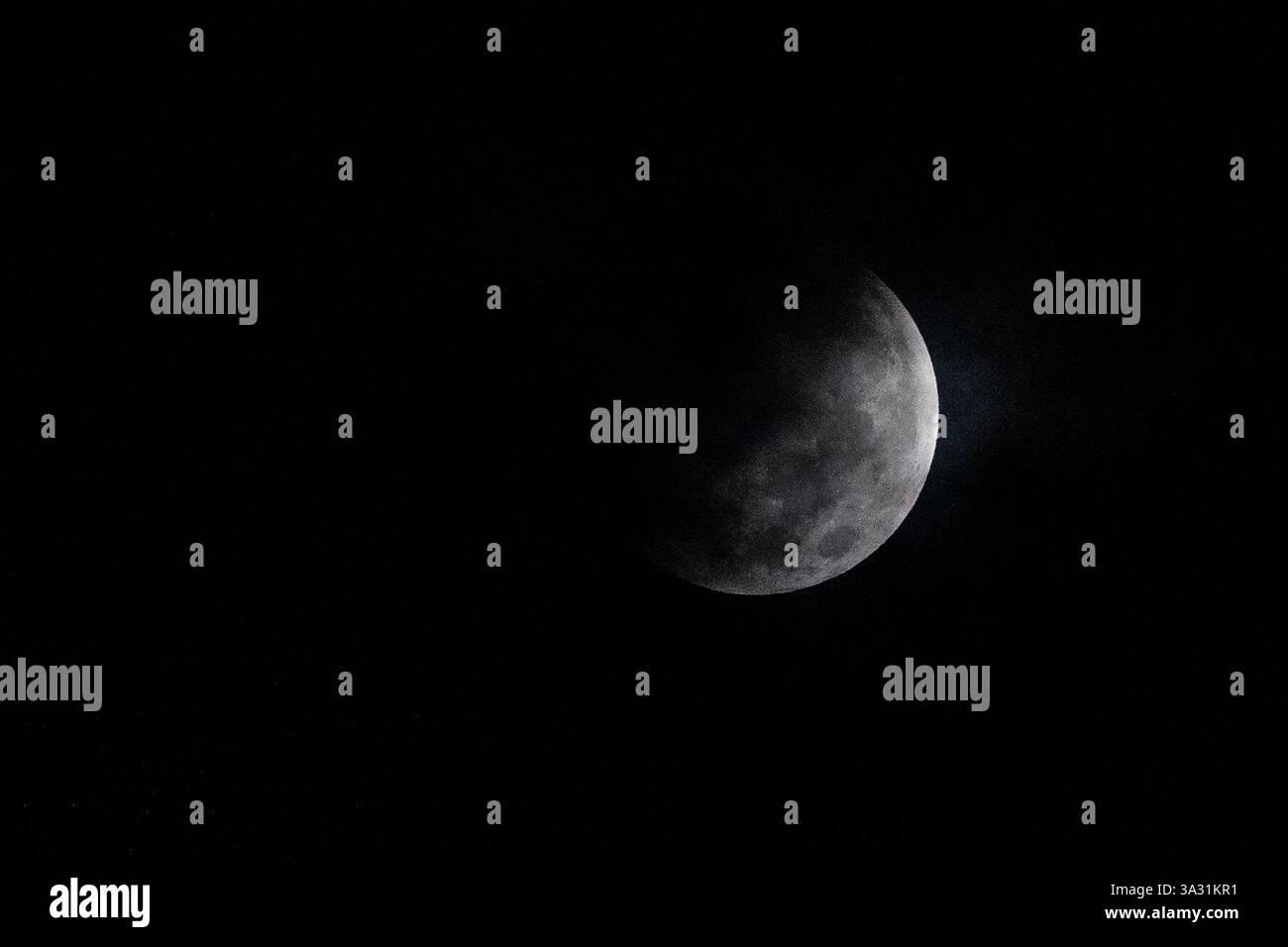Bogota, Colombia. 14th Mar, 2025. The moon is seen during a total lunar ...