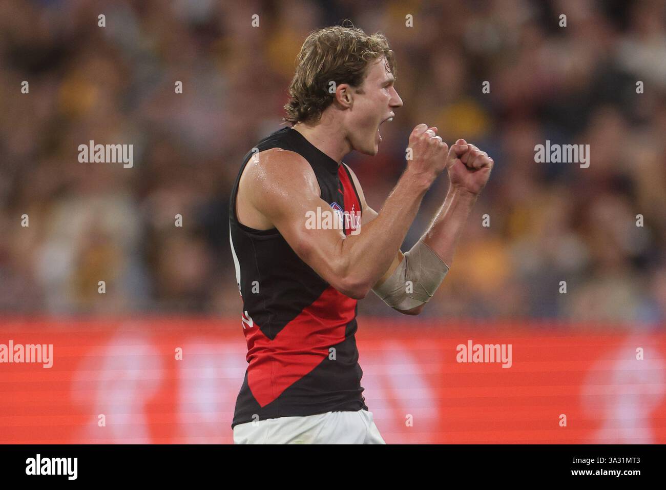 Xavier Duursma of the Bombers celebrates kicking a goal during the AFL ...