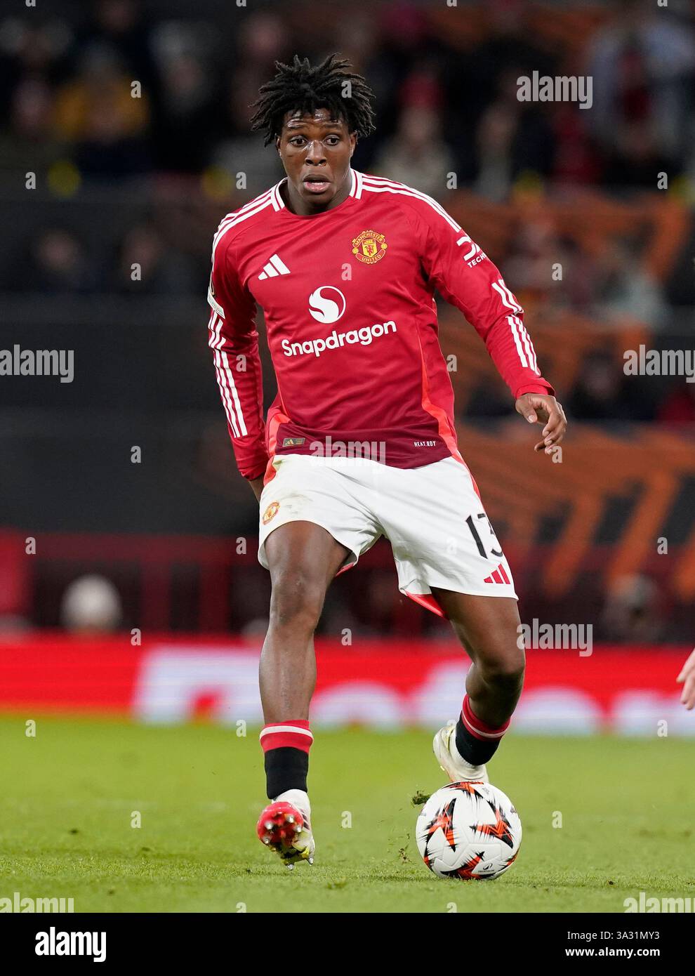 Manchester, UK. 13th Mar, 2025. Patrick Dorgu of Manchester United ...
