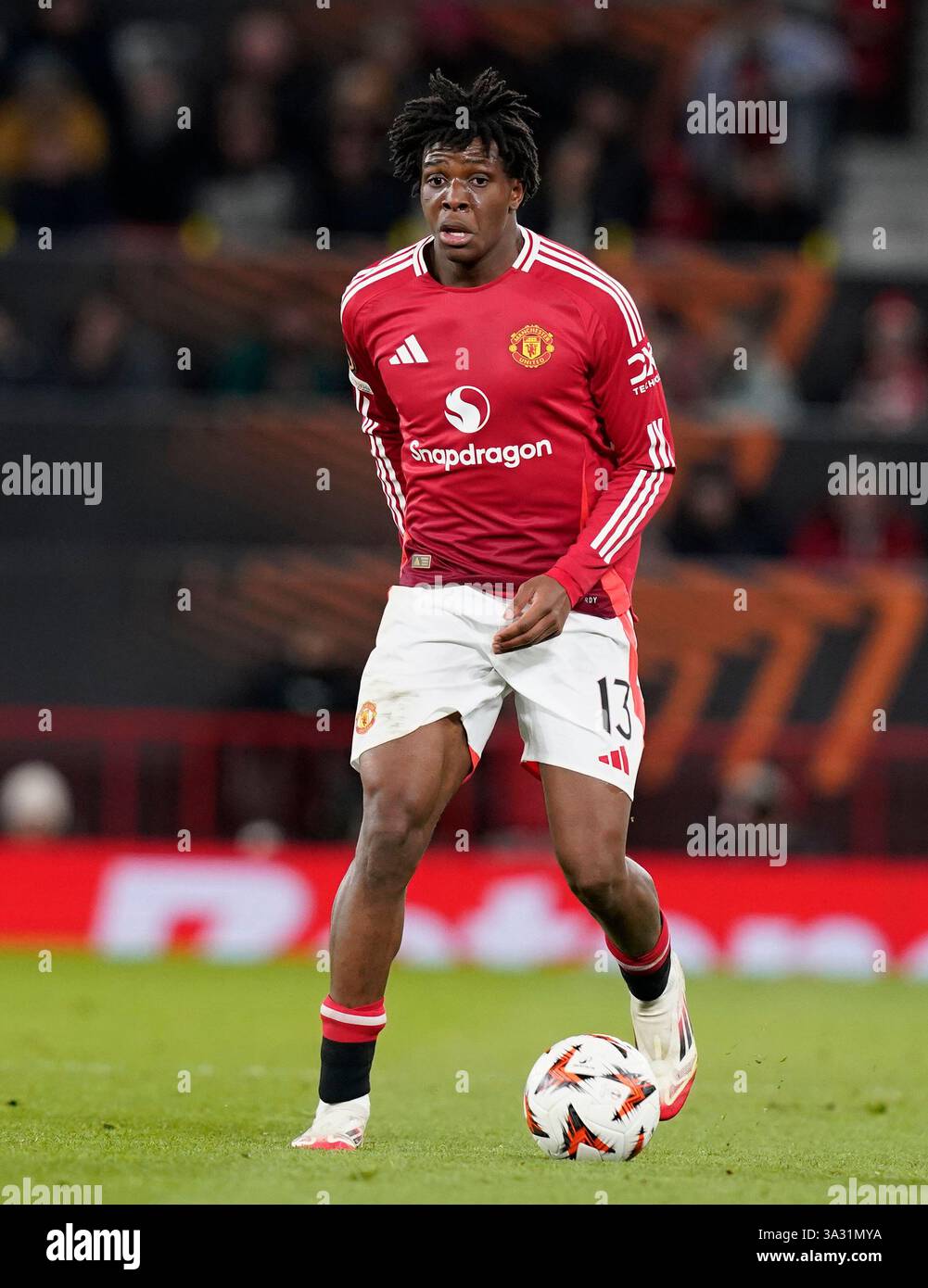 Manchester, UK. 13th Mar, 2025. Patrick Dorgu of Manchester United ...