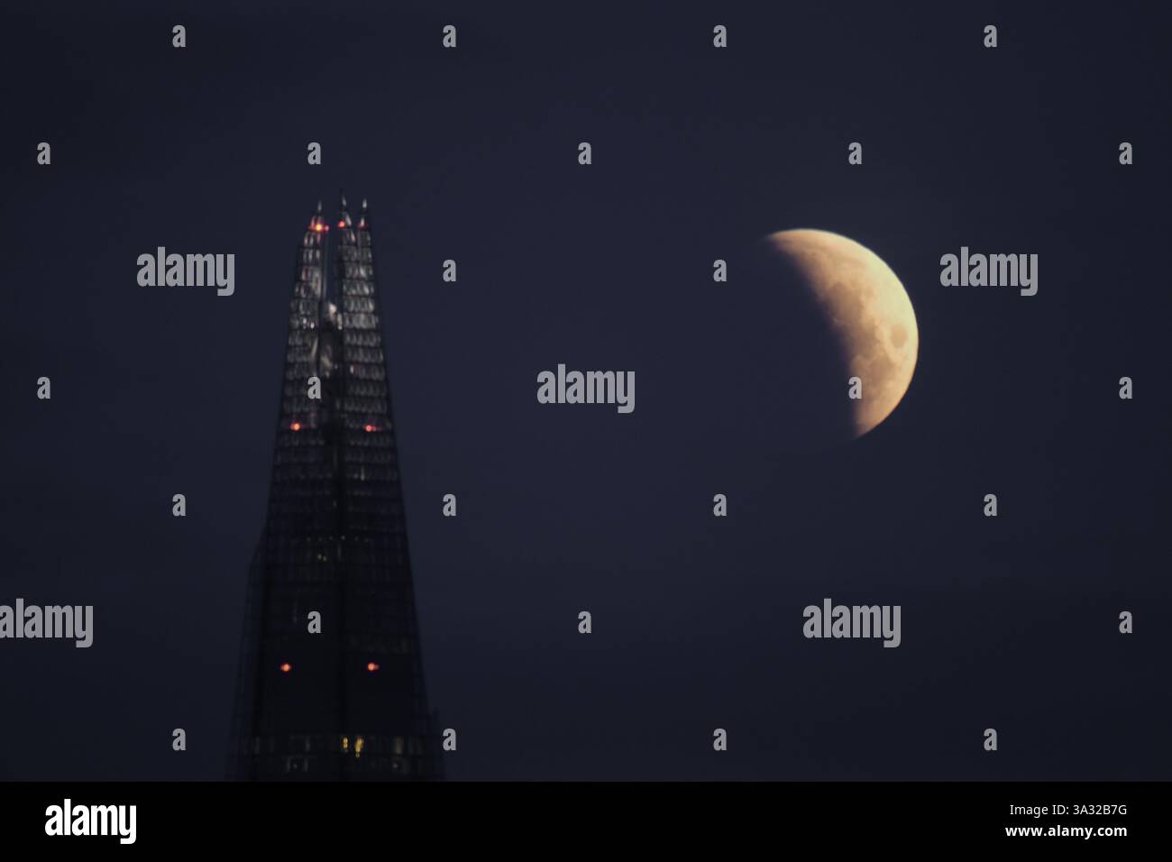 Partial blood moon lunar eclipse over The Shard, London, 14th March ...
