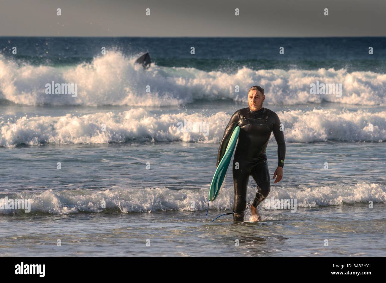 Surf session carrying hi-res stock photography and images - Alamy