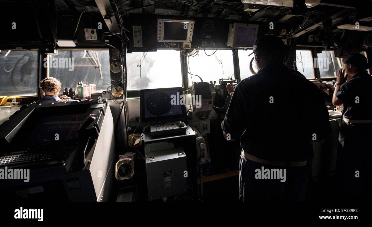 Sep 23, 2014 - Arabian Gulf - Sailors stand watch on the bridge while ...