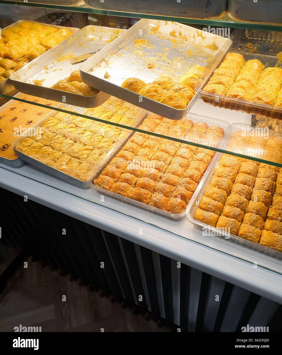 Traditional turkish sweets shop: baking sheets covered with baklava ...