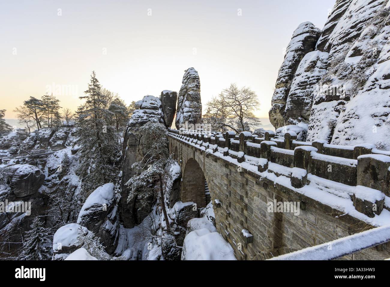 Snow on the Bastei bridge, rock gate and rock castle Neurathen in the ...