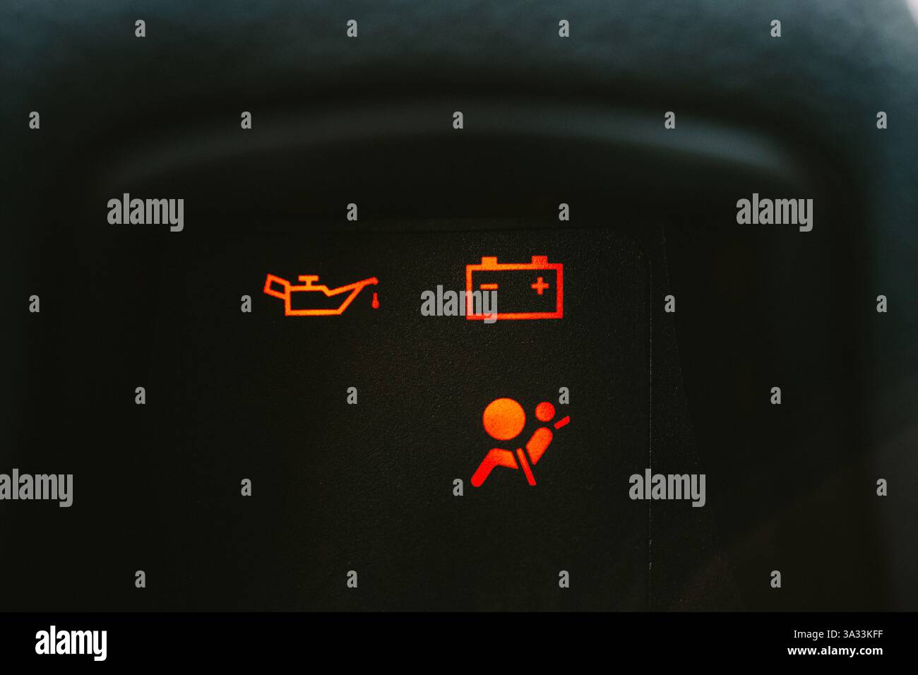 Car dashboard with illuminating check engine, check oil and check seat ...