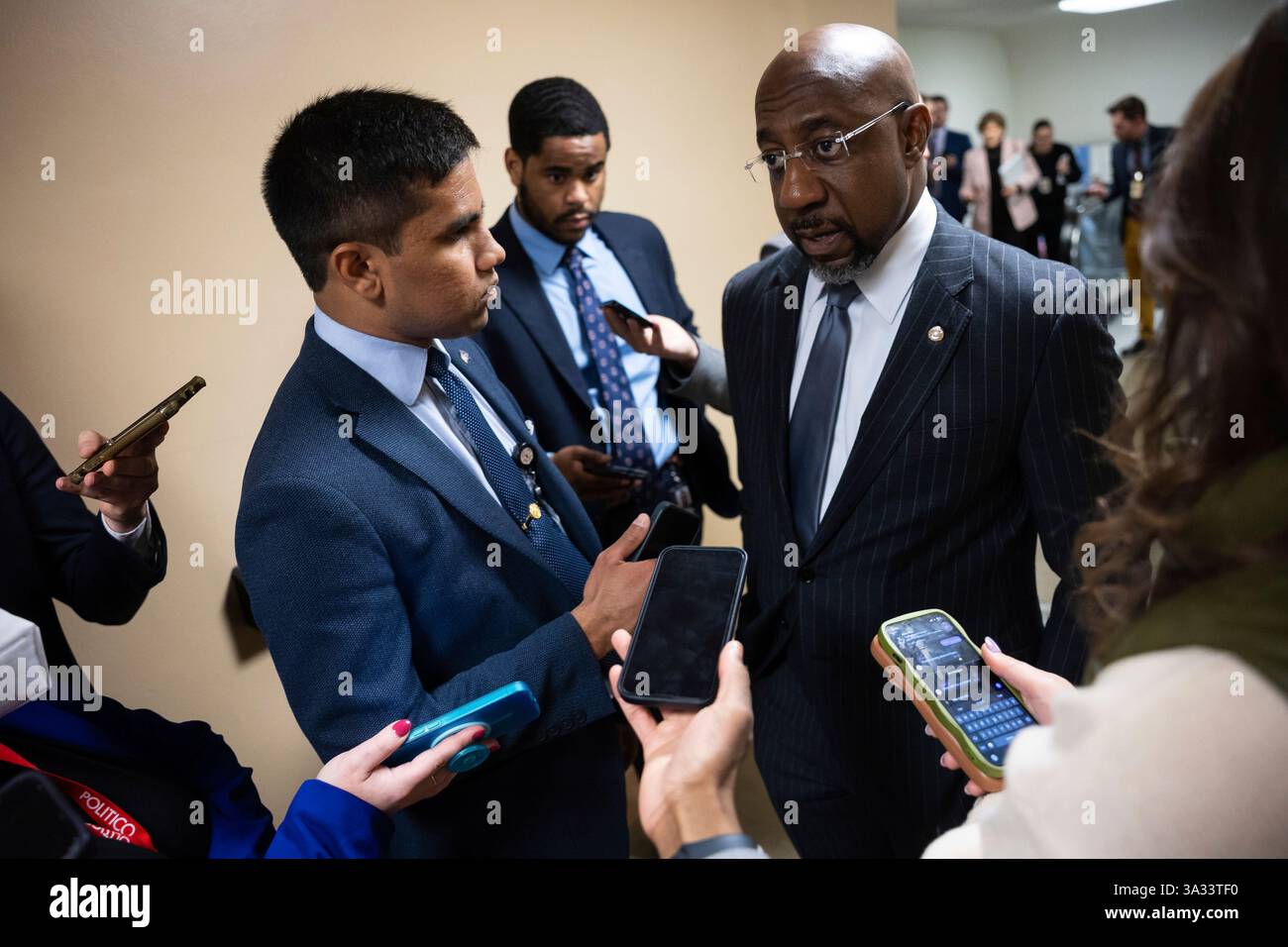 Sen. Raphael Warnock (D-Ga.) speaks with reporters at the U.S. Capitol March 13, 2025. (Francis ...