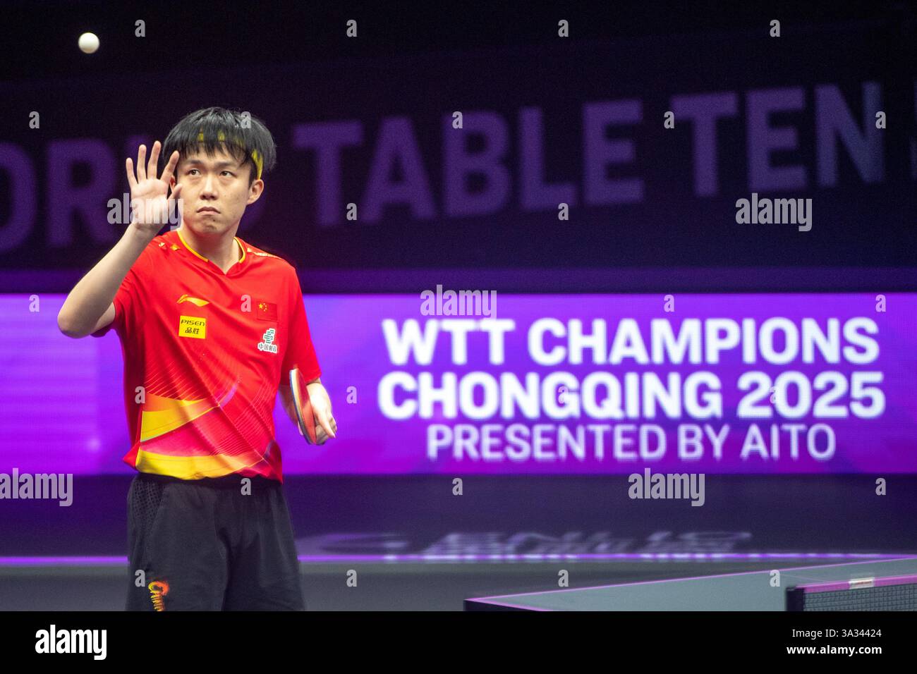 Chongqing, China. 14th Mar, 2025. Wang Chuqin reacts during the men's ...