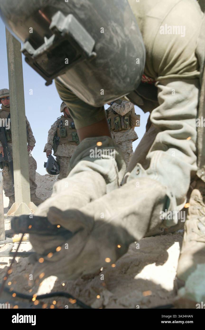Mar 22, 2004; Rawah, Iraq; Lance Cpl. KERRY M. PLESS, a metalworker ...