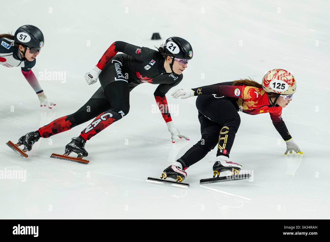 BEIJING, CHINA - MARCH 14: Rikki Doak of Canada, Jingru Yang of China ...