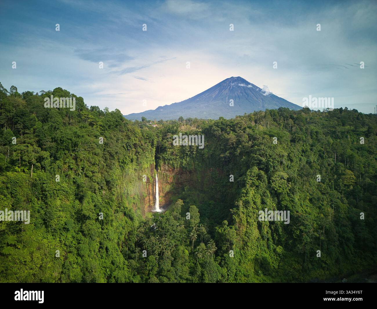 A breathtaking landscape showcasing the towering Mount Semeru volcano ...