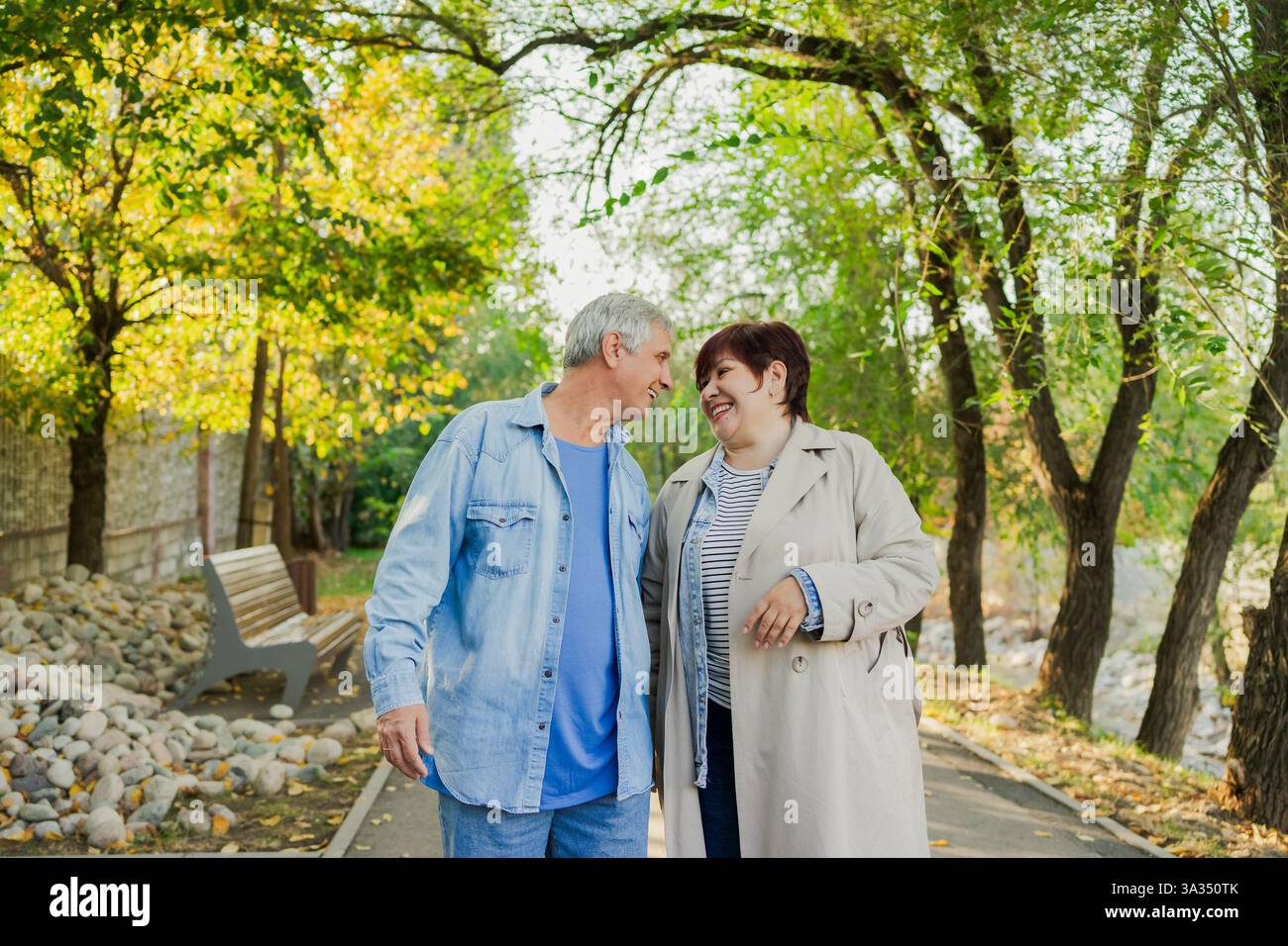 Playful senior park moment hi-res stock photography and images - Alamy