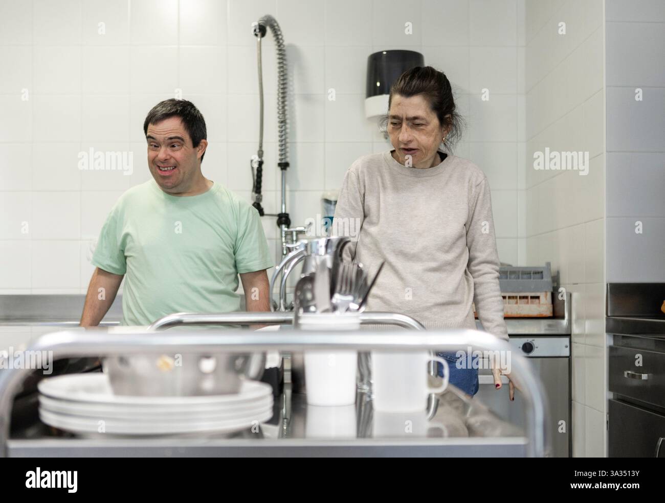 Helping with daily task hi-res stock photography and images - Alamy