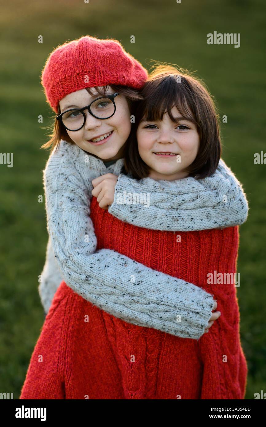 Happy boy girl in caps hi-res stock photography and images - Alamy