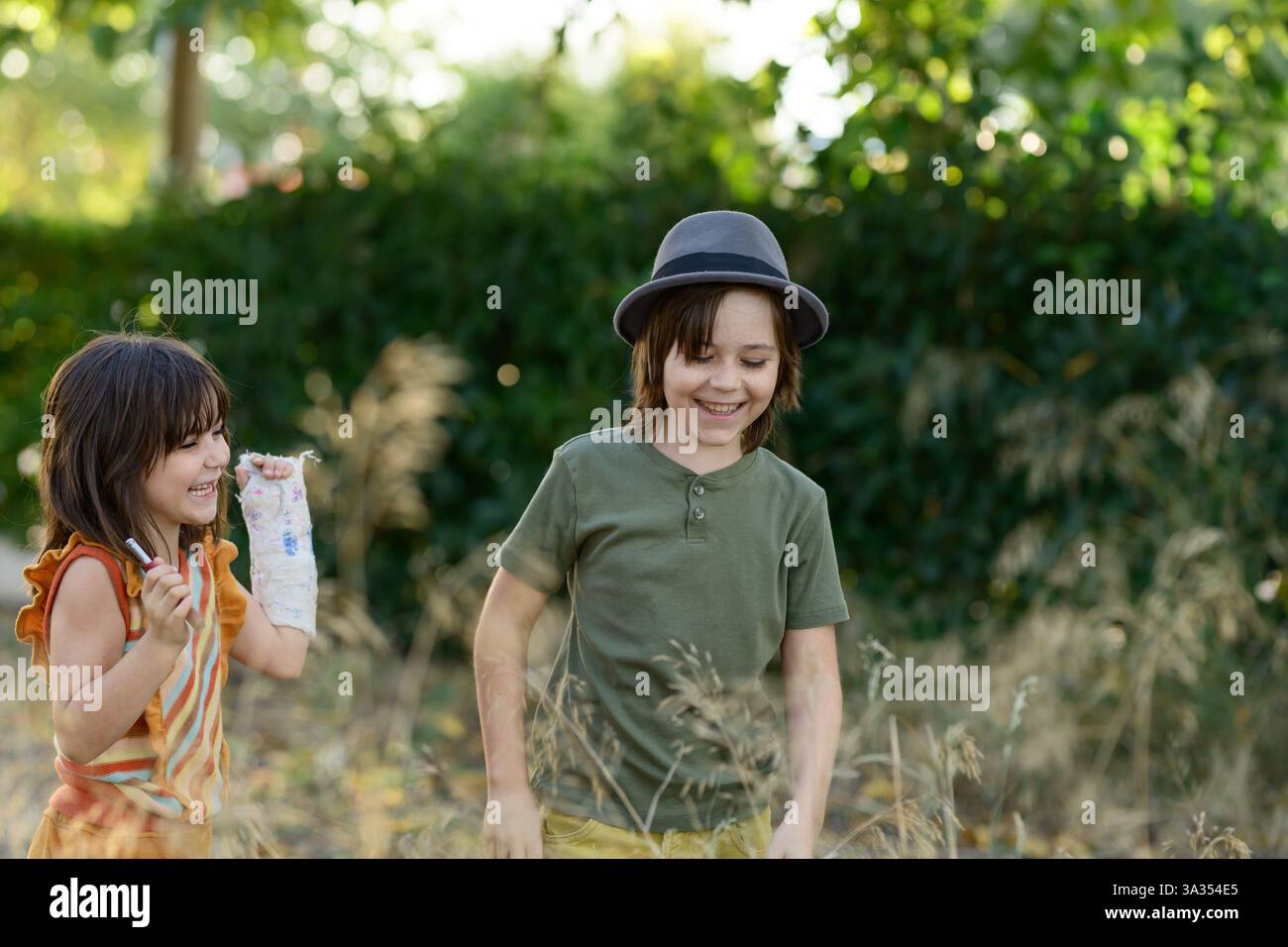 Two children joyfully explore a garden, surrounded by lush greenery ...