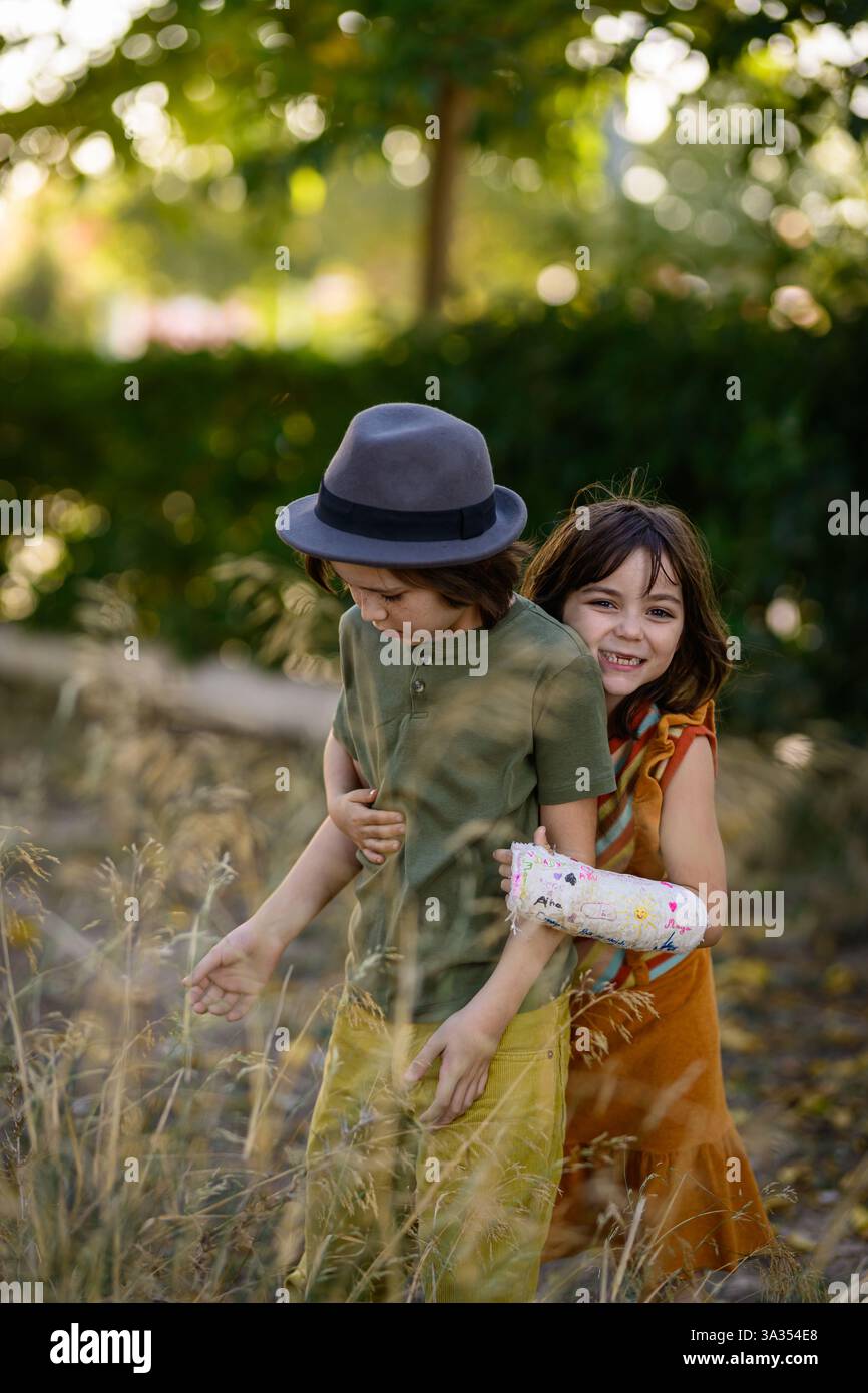 Two children playfully enjoy hi-res stock photography and images - Alamy