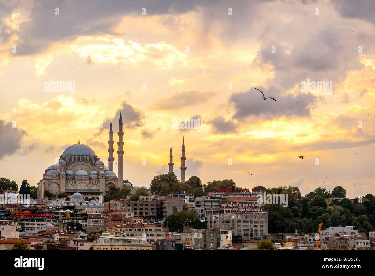 A stunning sunset over Istanbul, showcasing the magnificent Suleymaniye ...
