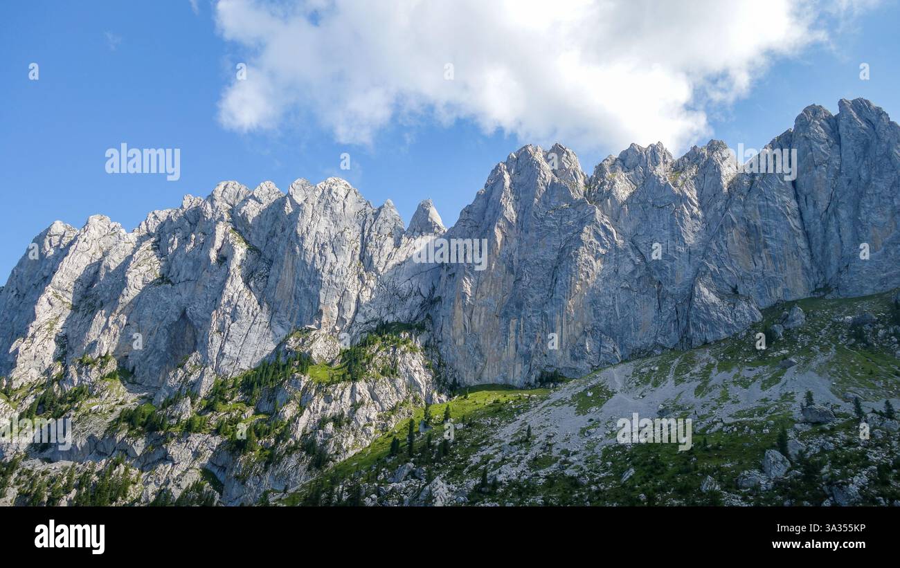 A breathtaking view of the jagged, rocky peaks of Jaun Pass, towering ...