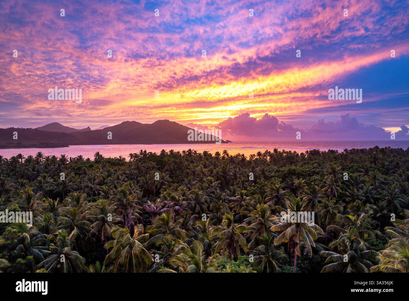 Aerial view of remote Tropical Islands surrounded by Coral Reefs in ...