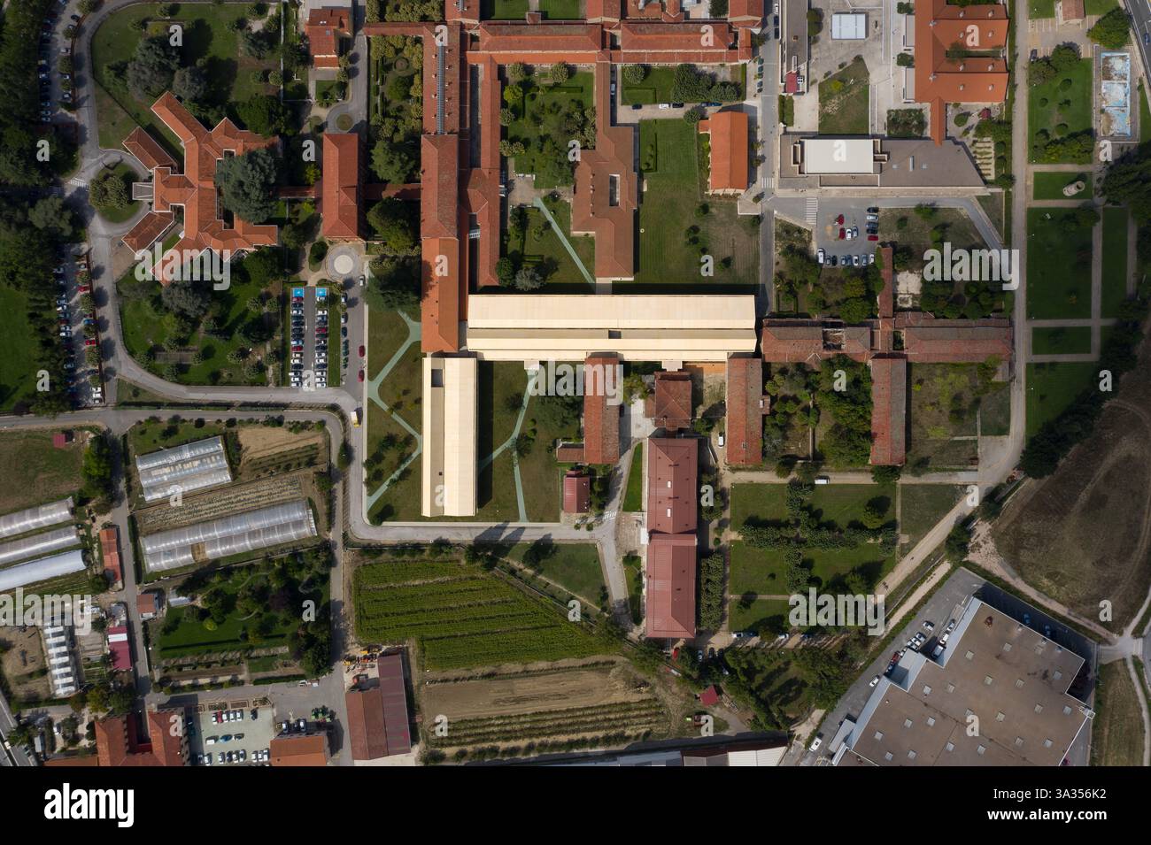 Aerial view of a large hospital with interconnected buildings ...
