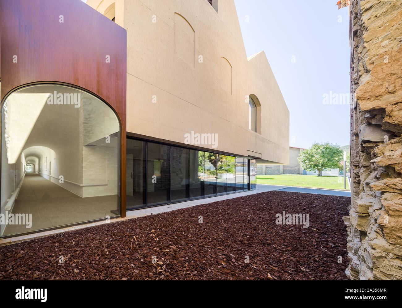 A striking architectural design of hospital showcases a blend of stone ...