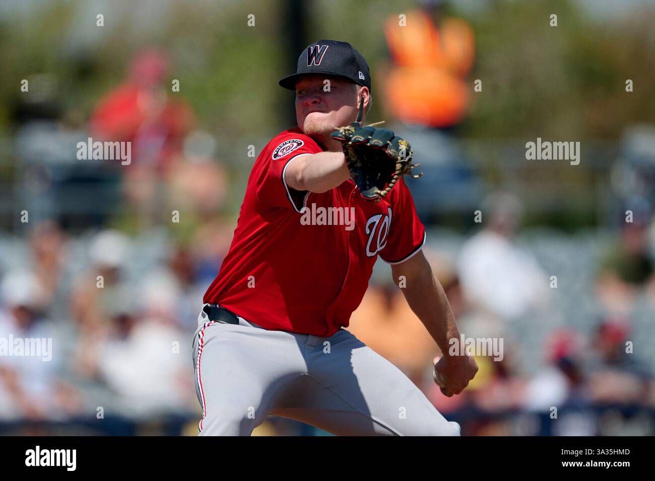 Washington Nationals pitcher DJ Herz (77) delivers a pitch during an ...