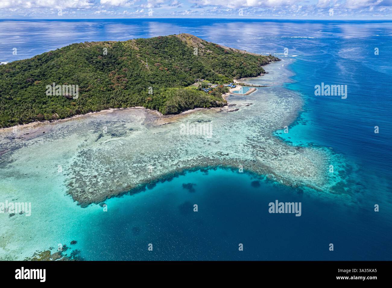 Aerial view of remote Tropical Islands surrounded by Coral Reefs in ...