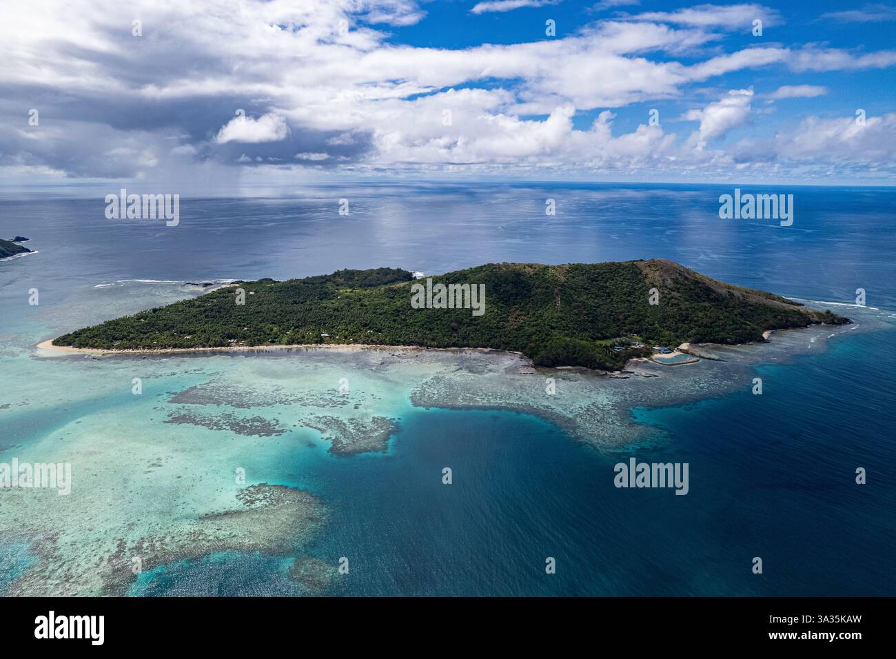 Aerial view of remote Tropical Islands surrounded by Coral Reefs in ...