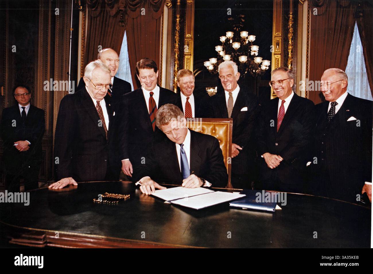 United States President Bill Clinton signs his first presidential ...