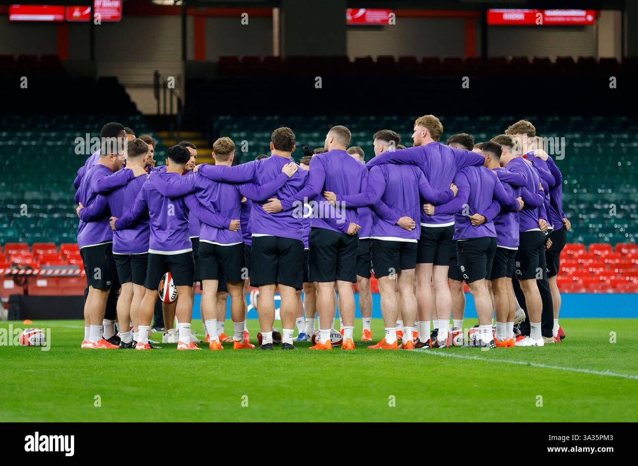England players huddle before the captain's run at the Principality ...