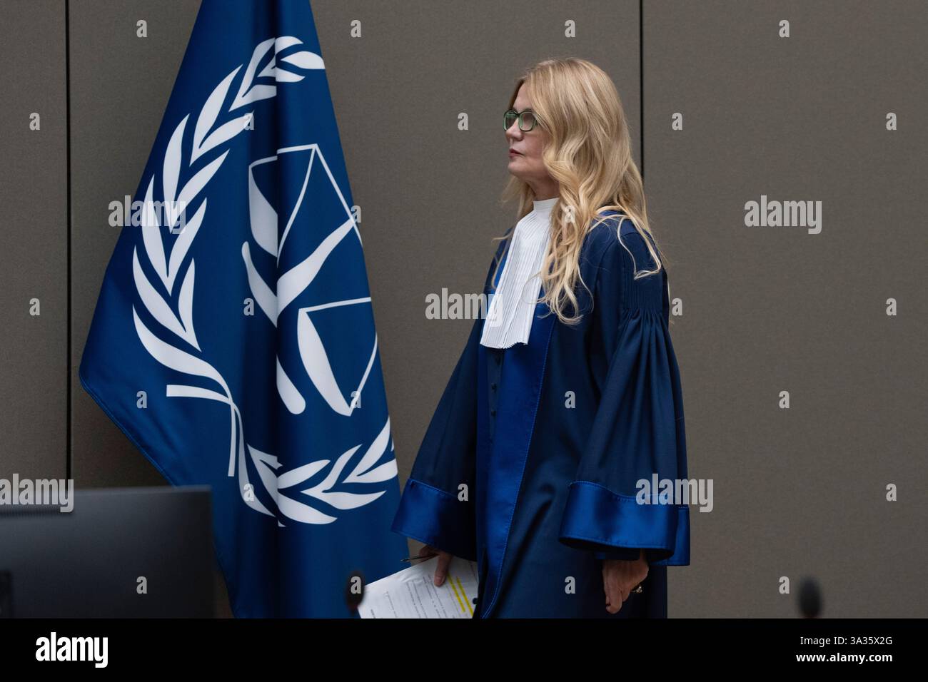 Presiding judge Iulia Antoanella Motoc enters the courtroom where ...