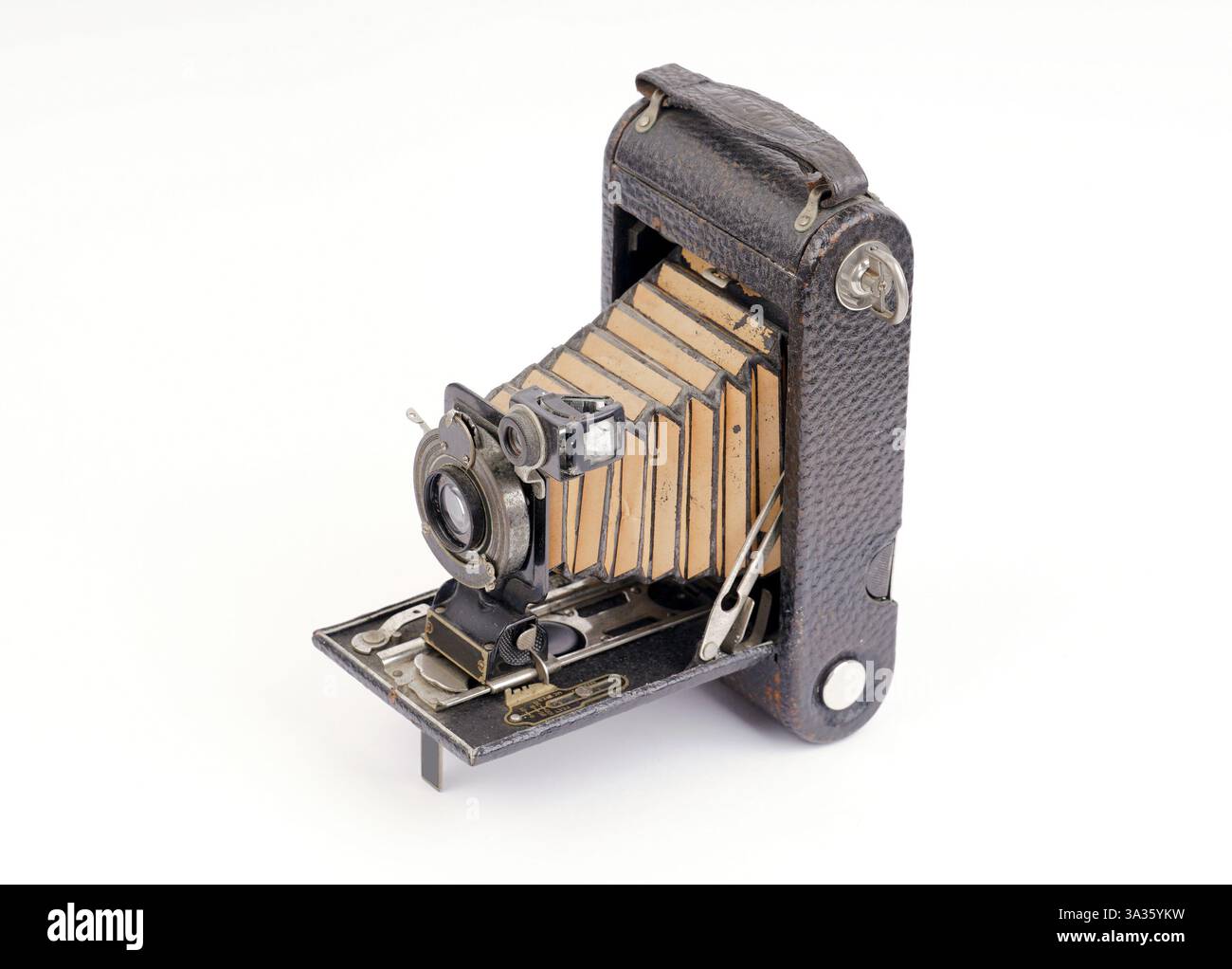 old vintage folding camera on white background Stock Photo - Alamy